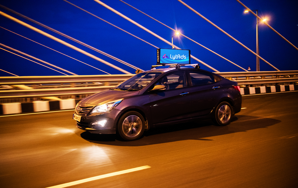 Wrap2Earn - Advertise on cars around India